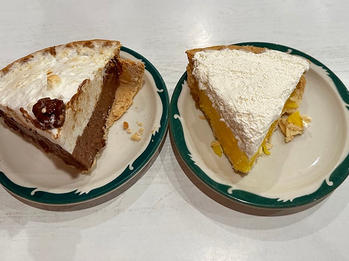 Two slices of heaven – cream pies with mile-high meringue that make you realize why people drive for hours just for a taste of Cooky's desserts.