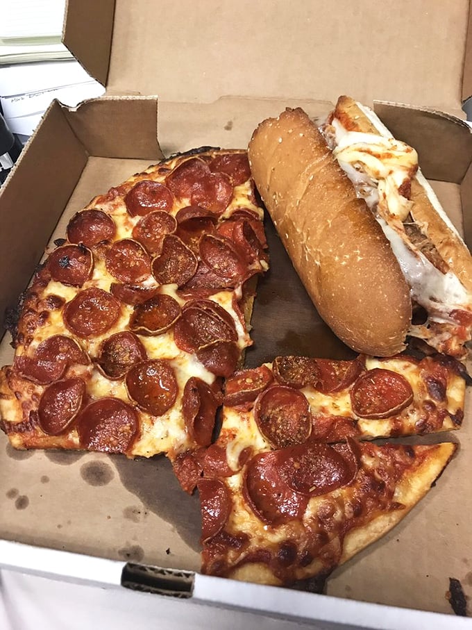 The ultimate power couple: pepperoni pizza and a sub sharing a box like they're on their honeymoon. Some matches are just meant to be.