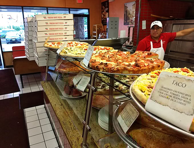 Pizza paradise in plain view—where dough becomes art and toppings become the painter's palette in this display of circular satisfaction.