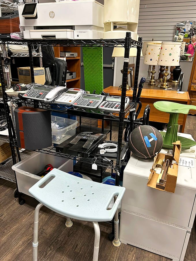 Electronics and gadgets creating a tech support nightmare that somehow feels oddly comforting and nostalgic.