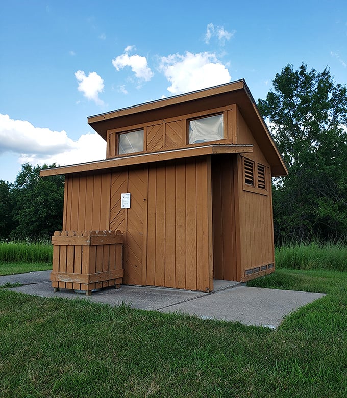Not all heroes wear capes—some are rustic wooden structures offering blessed relief when you're miles from modern plumbing.