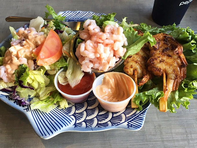 The seafood combo plate – where indecision becomes a virtue. Why choose one ocean delight when you can have them all?