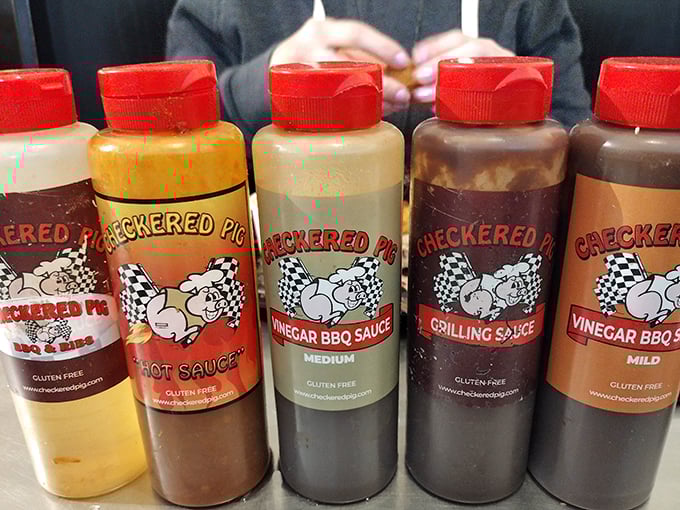 The sauce lineup looks like a chemistry experiment gone deliciously right. From mild to "you might need a glass of milk with that." 