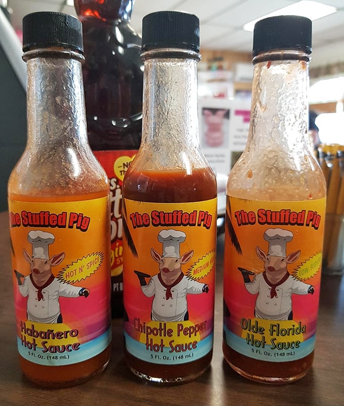 The hot sauce trio – because sometimes breakfast needs a wake-up call that coffee alone can't provide. Choose your adventure: mild, wild, or "I regret everything."