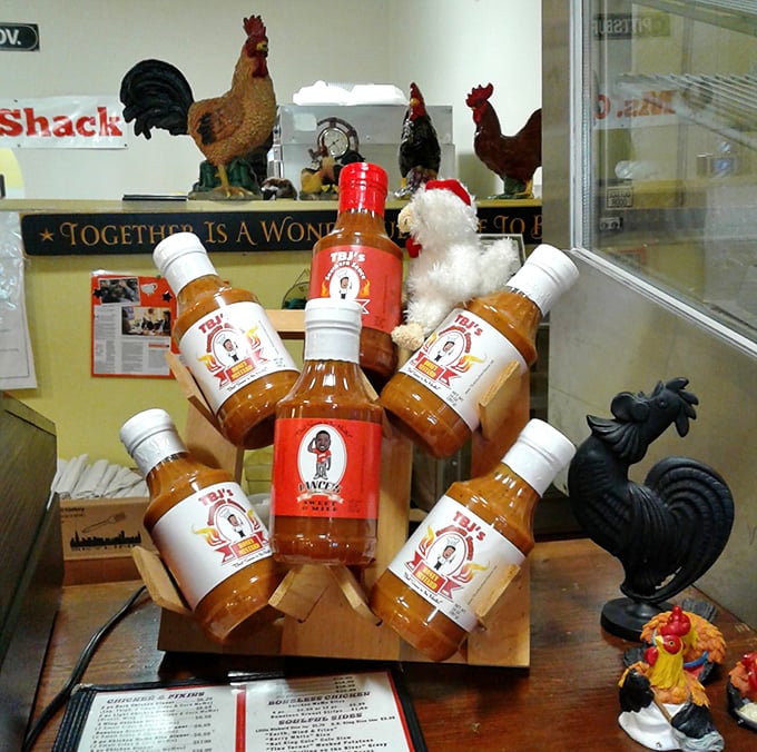 Their house-made sauces surrounded by chicken décor—a shrine to flavor that tells you these folks take their condiments as seriously as their poultry.