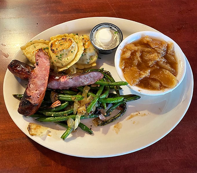 A plate that speaks to the heartland—savory sausage, perfectly prepared pierogies, and green beans that actually taste like vegetables should.