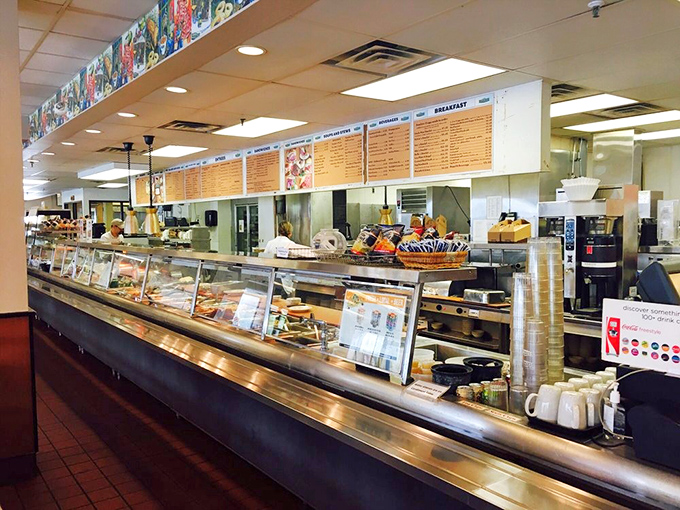 The service counter where decisions matter. Veterans know exactly what they want; first-timers stand slack-jawed at the parade of possibilities behind the glass.