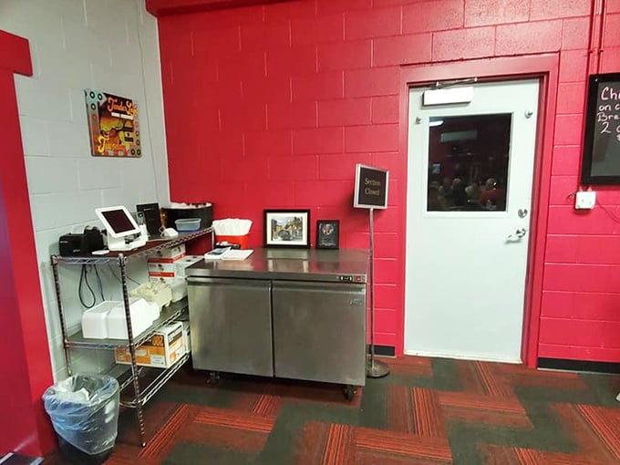 Behind this counter, breakfast dreams become reality. The red walls aren't just decorative – they're warning signs that flavor explosions are imminent.
