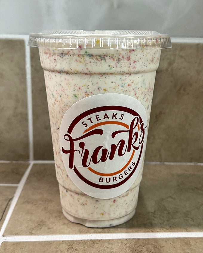 This isn't just a milkshake—it's a cup of happiness with sprinkles mixed in, wearing the Frank's logo like a badge of honor.