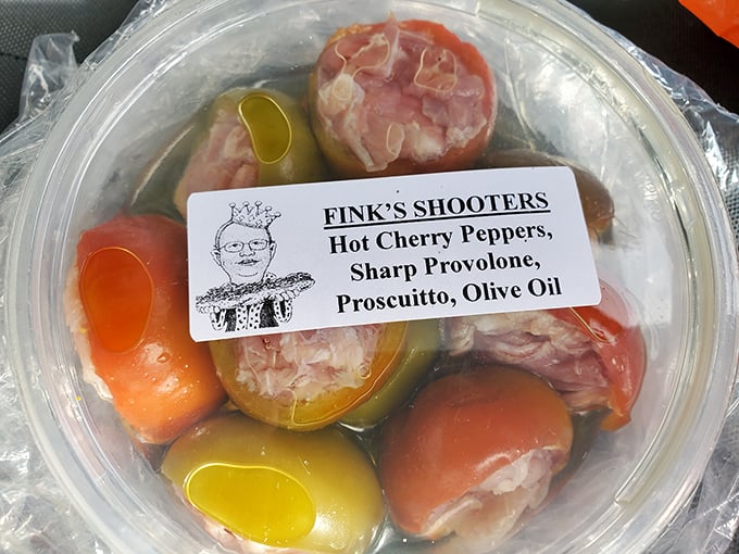 Fink's Shooters: Hot cherry peppers stuffed with prosciutto and sharp provolone—tiny flavor grenades that explode with a perfect balance of heat, salt, and tang.