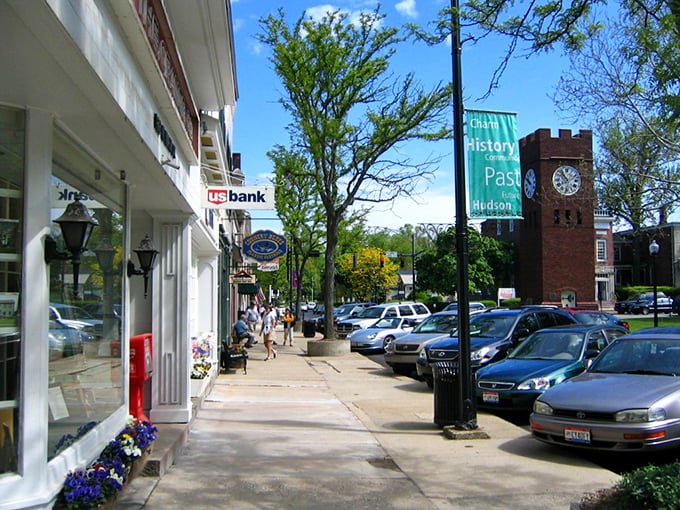 Hudson's sidewalks bloom with flowers and friendly faces—small-town charm where even errands feel like a pleasant social occasion.