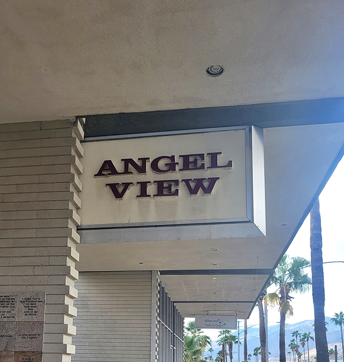 The purple lettering against desert-white stucco announces your arrival at thrifting nirvana. Palm trees included at no extra charge.