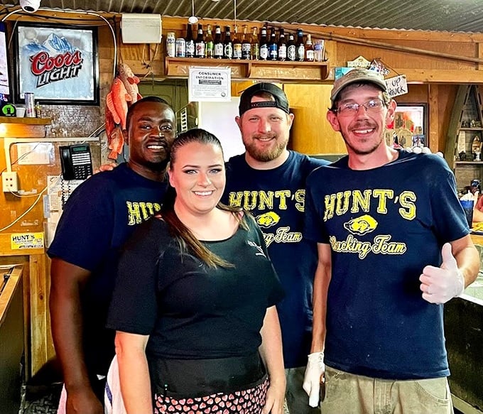 The staff's shirts say "Shucking Team" because "Seafood Magicians" wouldn't fit. These are the folks who make the magic happen.
