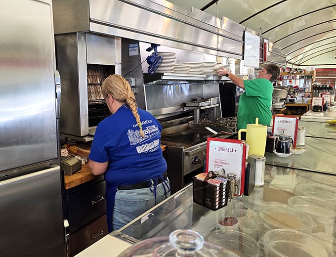 Behind every great diner is a team that knows the difference between cooking and caring. These folks aren't just staff—they're keepers of tradition.