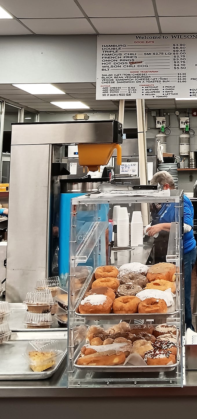 Behind every great local institution are dedicated people keeping traditions alive. The display case of fresh-made donuts suggests Wilson's isn't just about savory delights. 