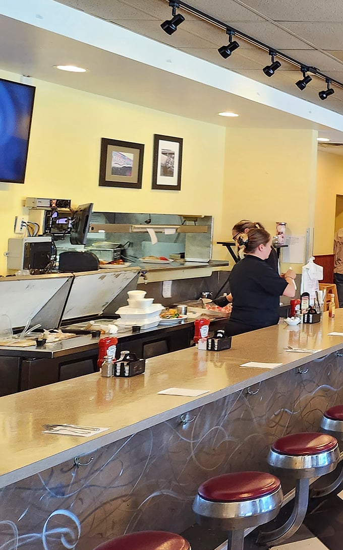 The breakfast ballet in action—where skilled hands orchestrate the symphony of sizzles and flips that become your morning masterpiece.