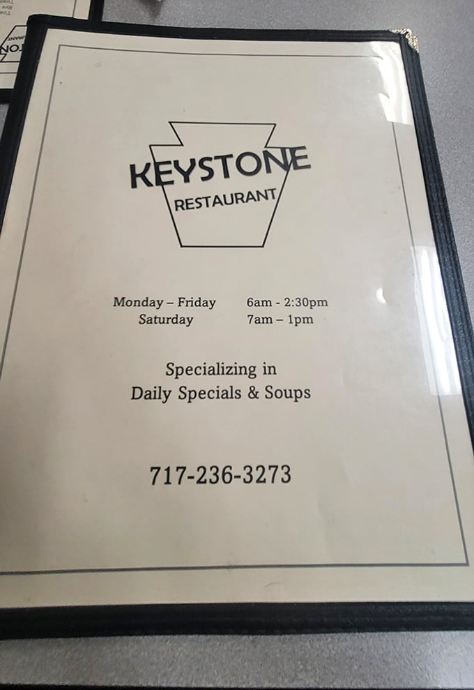 The menu cover reveals the essential information: hours, specialties, and a logo shaped like the Keystone State. Simplicity at its finest.