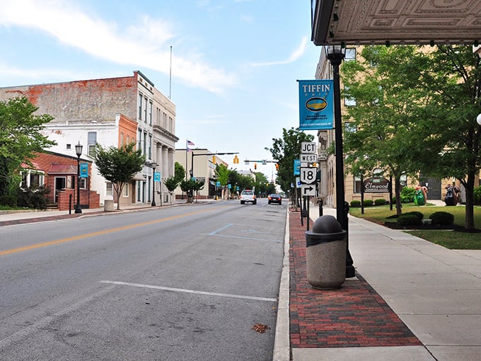 Tiffin's banners and brick sidewalks create streetscapes that feel intentional rather than accidental – urban planning with actual humans in mind.