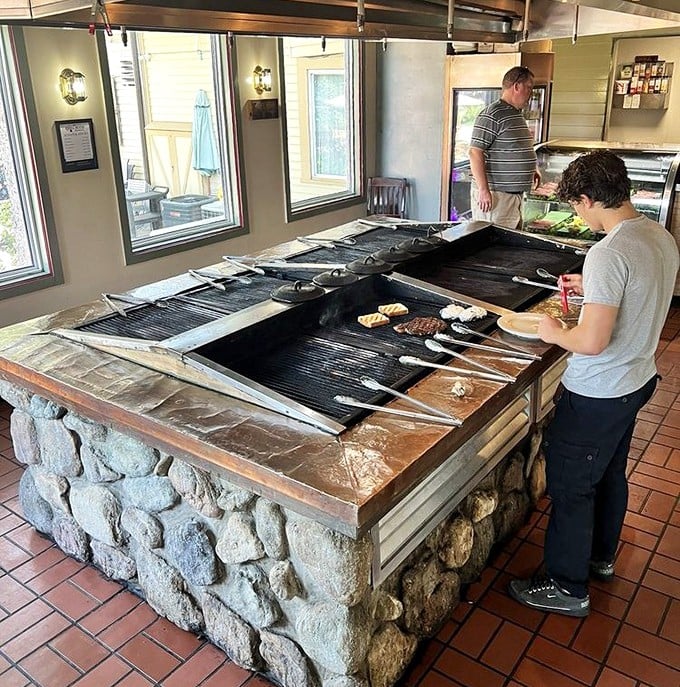Where the magic happens—a stone-based grill that transforms ordinary cuts into extraordinary memories. Meat nirvana, found.