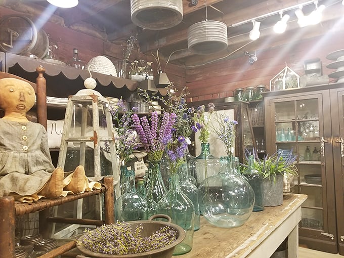 Sunlight dances through vintage glass, creating a kaleidoscope of blue-green reflections that would make any farmhouse table Instagram-worthy.