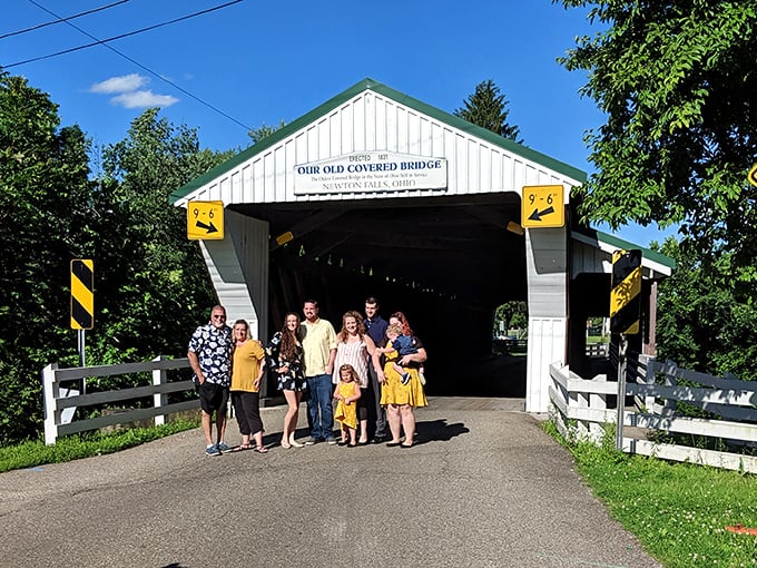 Family photos at historic landmarks: where matching outfits meet architectural preservation in America's time-honored tradition of documenting "we were here."