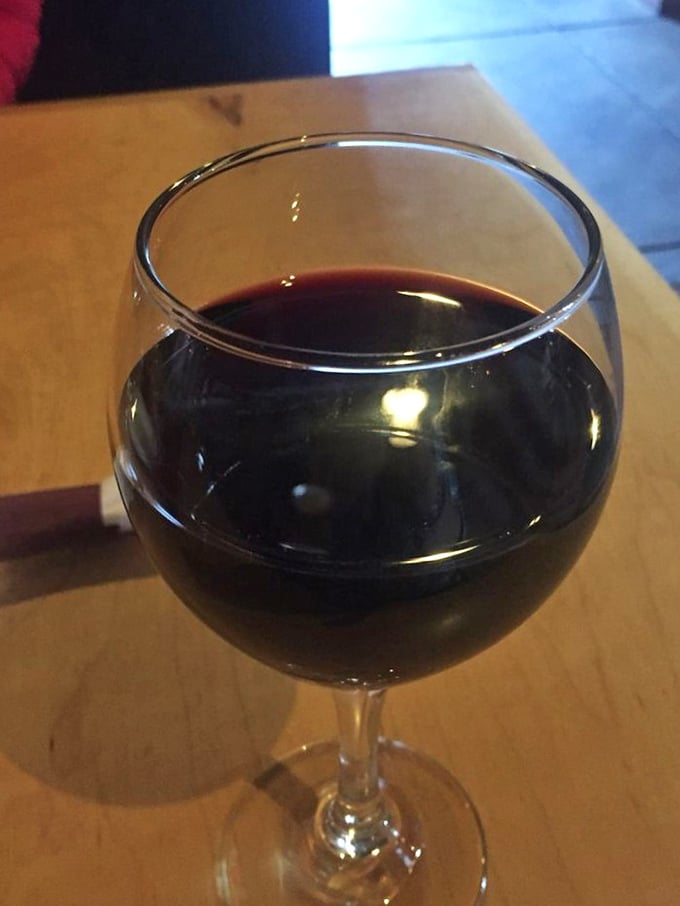A glass of house red that's not trying to impress wine snobs—just your taste buds. The perfect companion to pasta that would make any Italian grandmother weep with joy.