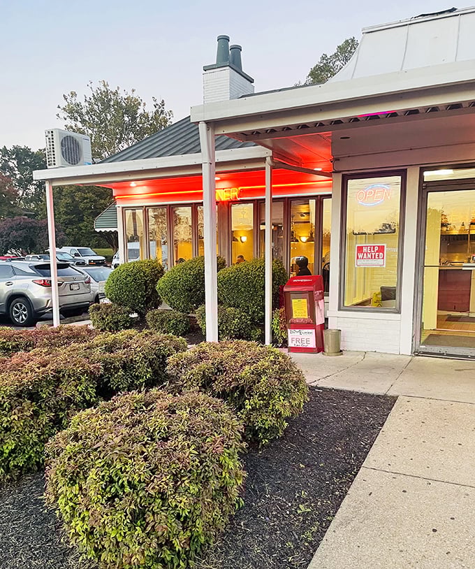Red neon and retro charm signal serious breakfast business at this College Park morning headquarters.