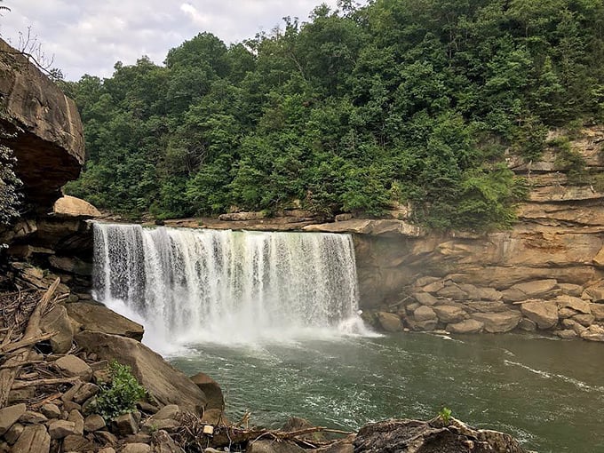 Cumberland Falls cascades dramatically over ancient rock formations, earning its nickname "The Niagara of the South" with misty splendor.