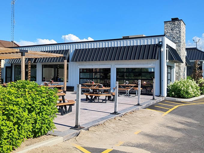 Jolly Rogers' modern design brings a fresh take on seafood traditions. Those picnic tables aren't just seating—they're front-row tickets to flavor town.