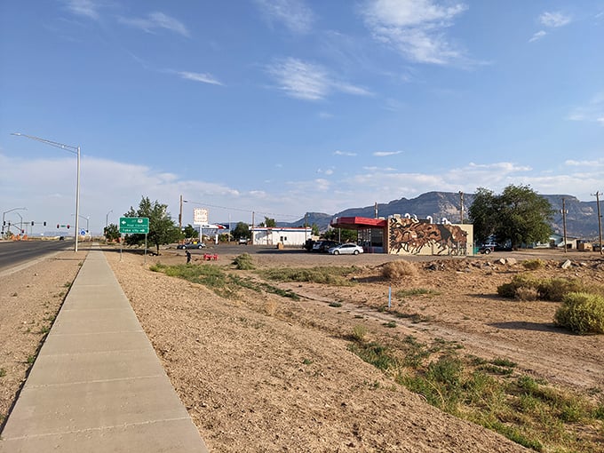 Kayenta's roadside mural celebrates heritage while gas prices celebrate your wallet – cultural richness meets financial relief under Monument Valley skies.
