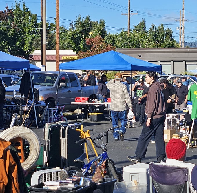 North Portland Flea Market proves you don't need walls to create shopping magic. Blue canopies, eager shoppers, and mountains of merchandise—what more could you want?