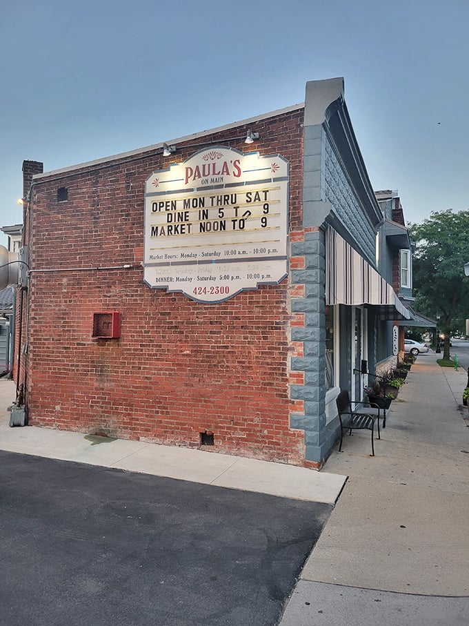 Paula's brick exterior might look unassuming, but that vintage sign promises seafood traditions done right.