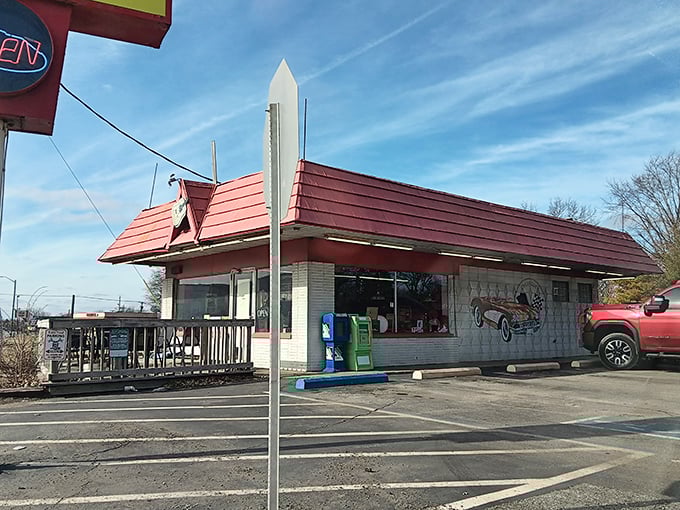 Vintage car murals and retro red roof - Rock-Cola 50's Cafe doesn't just serve nostalgia, it lives it.