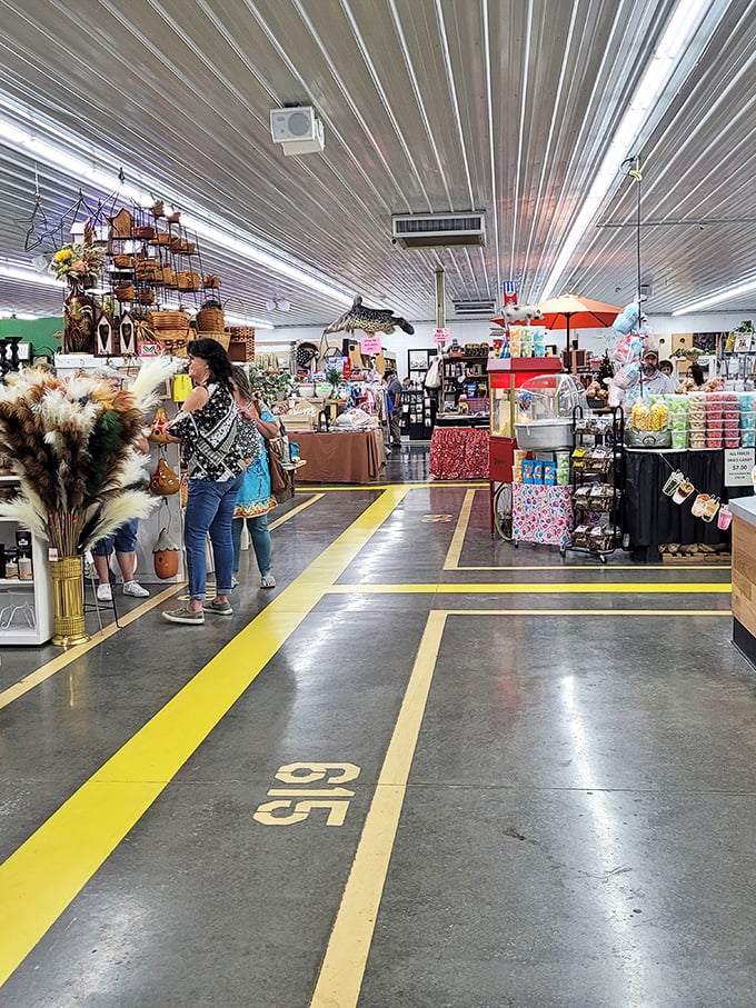Yellow lines guide treasure hunters through aisles packed with handmade wonders and memories.