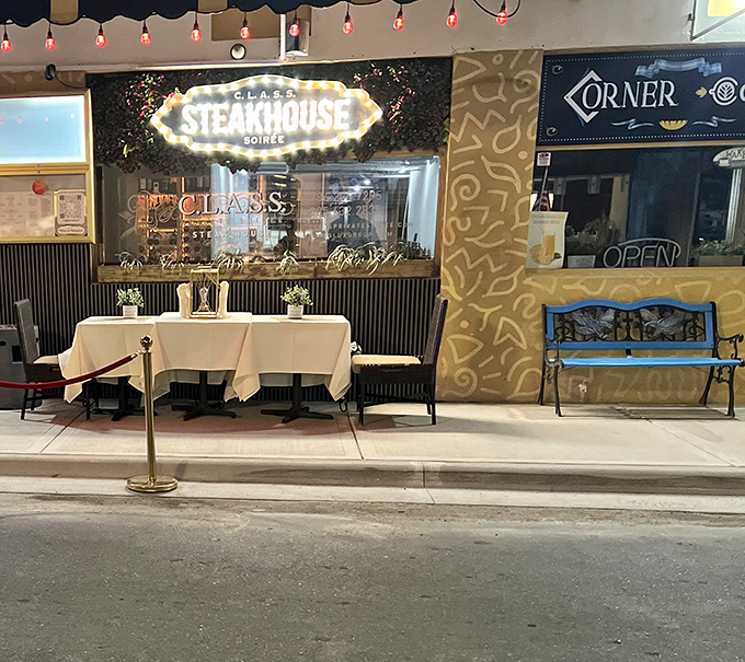 The twinkling lights frame CLASS Soiree like a Broadway marquee. This isn't just dinner—it's dinner with a supporting cast of ambiance and style.