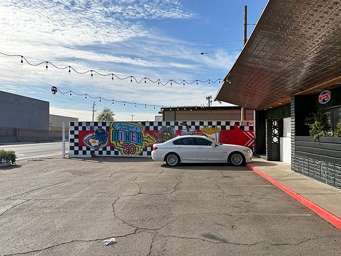String lights and murals create the perfect backdrop for memorable breakfast conversations and laughter.