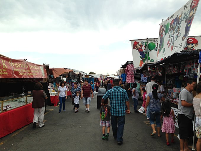 Shoppers stroll through the lively aisles of an outdoor market, where bargains, treats, and California’s easygoing vibe are always free.