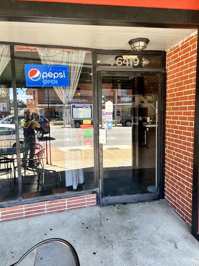 That welcoming entrance has seen countless satisfied customers waddle out, loosening their belts and planning their return visit.