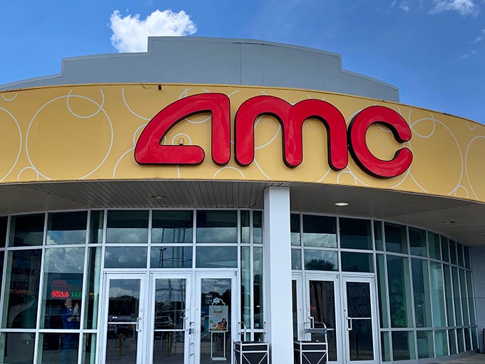 The AMC theater brings Hollywood to Leesburg, its curved yellow façade promising air-conditioned escape from Florida heat and reality alike.