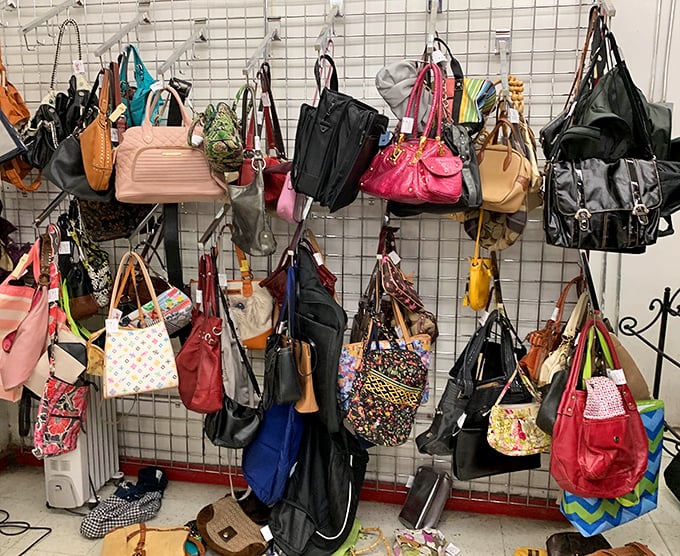 Handbag heaven or purse purgatory? This wall of accessories tells a thousand fashion stories, from designer knockoffs to genuine vintage finds.
