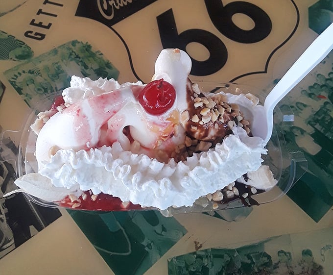 Ice cream architecture at its finest! This banana split is what happens when dessert becomes performance art on the Mother Road.