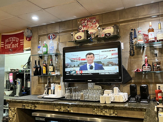 The bar area showcases San Francisco sports memorabilia—because nothing complements a bloody mary quite like local pride and championship dreams.