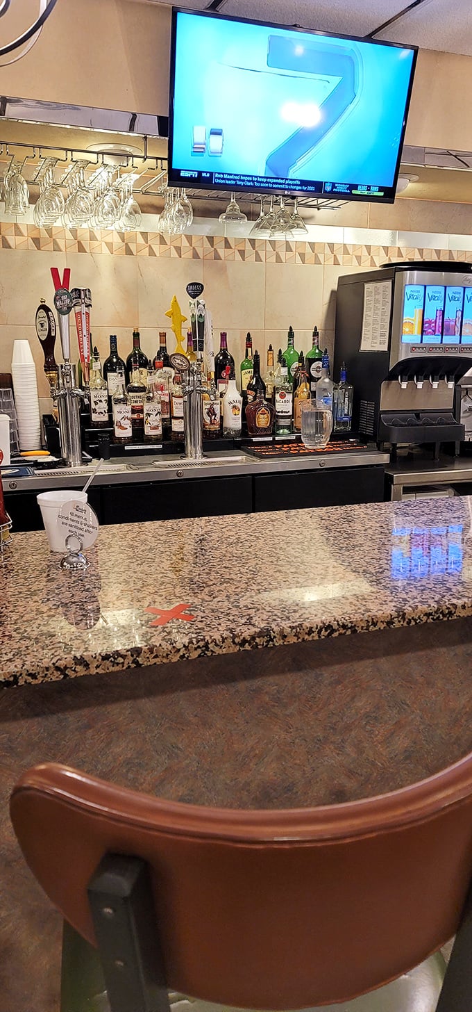 A fully stocked bar that says, "Yes, you can have a Manhattan with your meatloaf"—because sometimes adulting deserves a reward.
