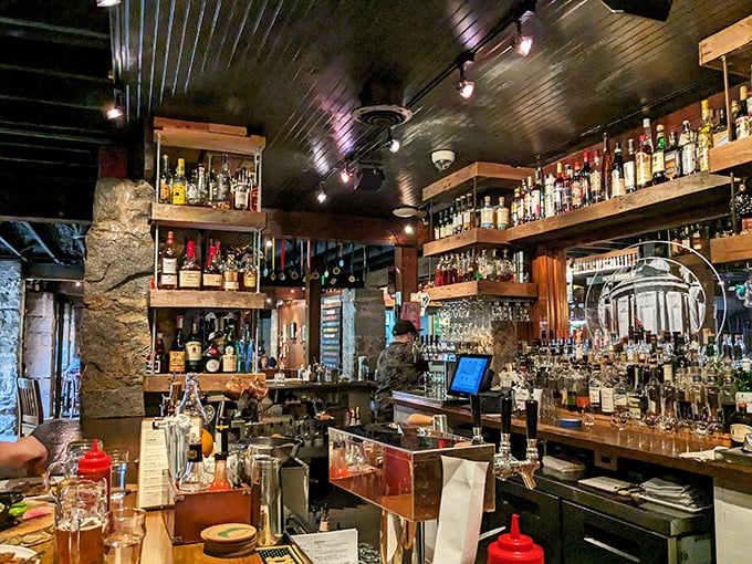 The bar doesn't just serve drinks—it showcases liquid art against a backdrop that makes every sip feel like a historical event.