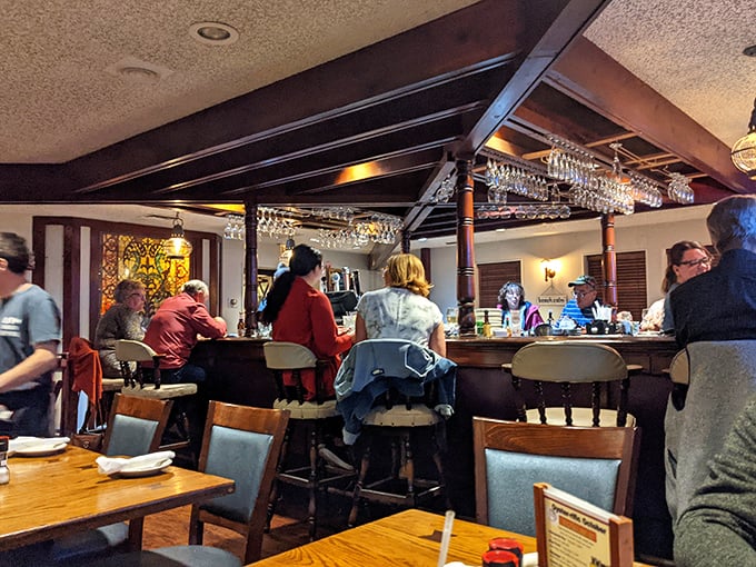 The bar isn't just where drinks are served – it's command central for seafood operations, where glasses clink and ocean tales grow taller.