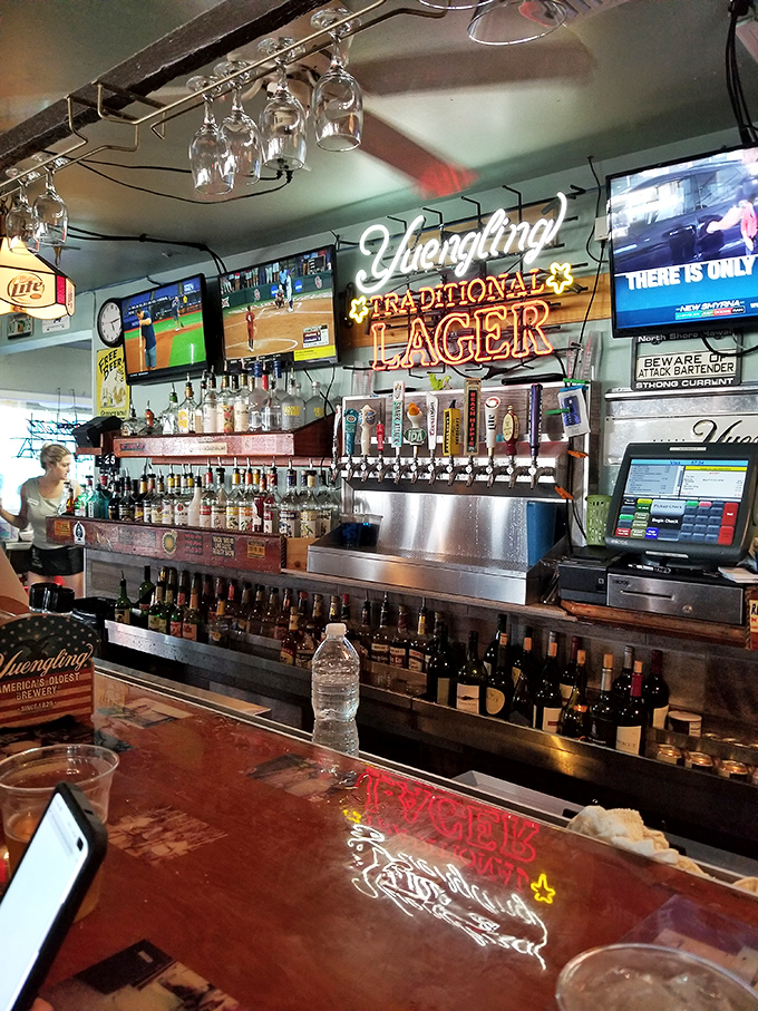 The bar at JB's—where cold beer flows freely and strangers become friends over stories of "the one that got away."