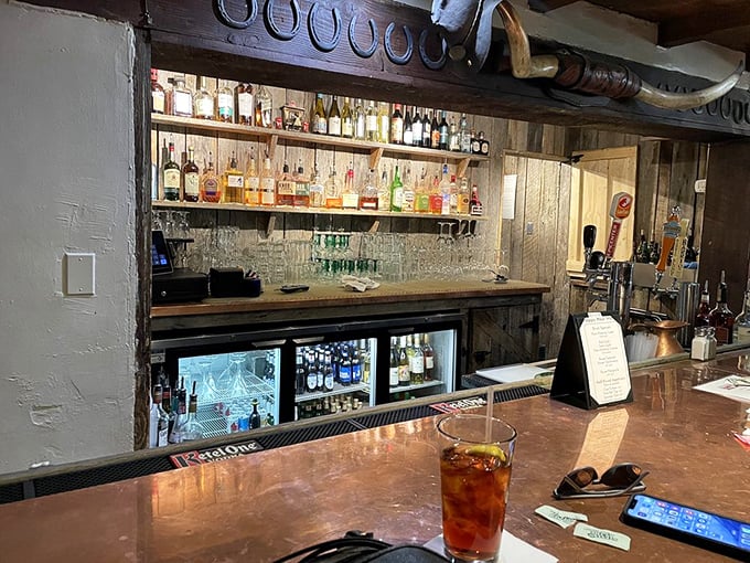 The bar at El Corral isn't trying to be trendy—it's too busy being timeless. Wood, spirits, and Western hospitality: some formulas don't need updating.