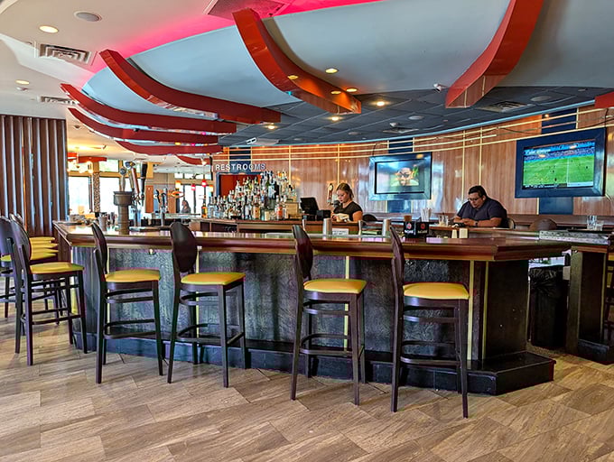 The bar area strikes that perfect balance between "I'm treating myself" and "I'm completely comfortable" – ideal for solo dining or meeting friends.