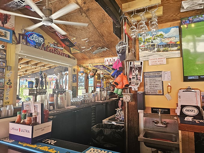 The bar's rustic wooden charm isn't manufactured by a designer—it's been earned through years of salt air, tall tales, and cold beer.