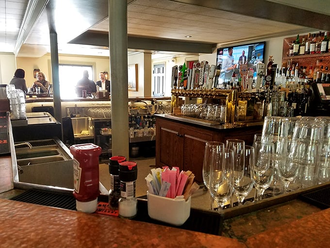 The well-stocked bar where local stories flow as freely as the craft beers and perfectly mixed cocktails.